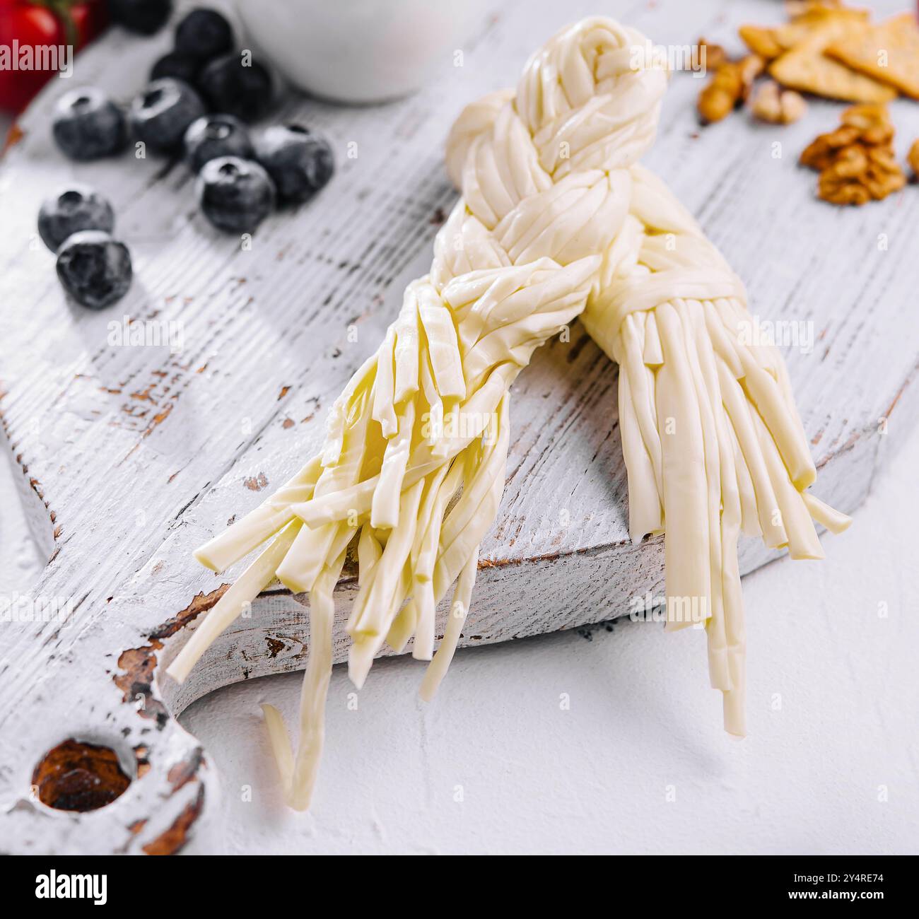 Traditional handmade Slovakian korbacik string Cheese Stock Photo - Alamy