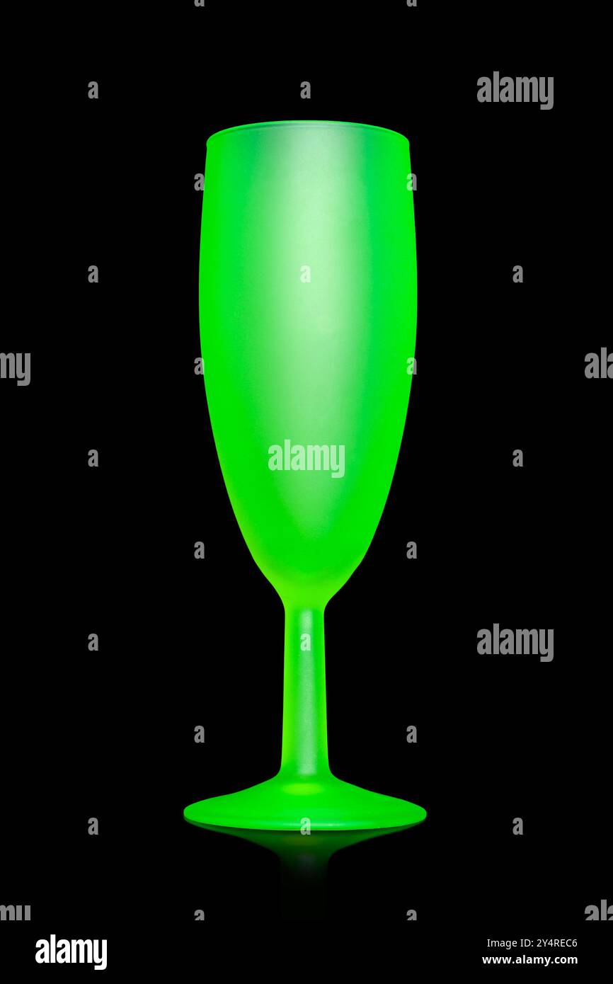 Green matt champaign glass isolated on black. Free space for text ...