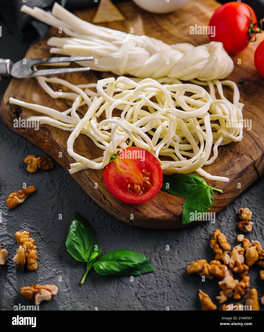 Traditional handmade Slovakian korbacik string Cheese Stock Photo - Alamy