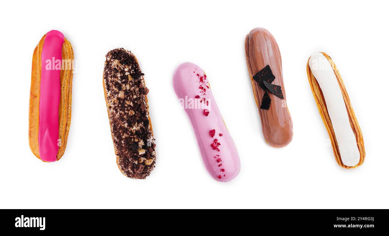 different types of French eclairs on a white plate isolated on white ...
