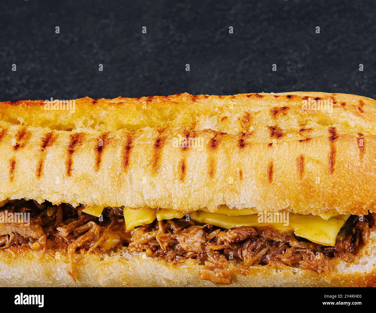 long sandwich with chicken and cheese Stock Photo - Alamy