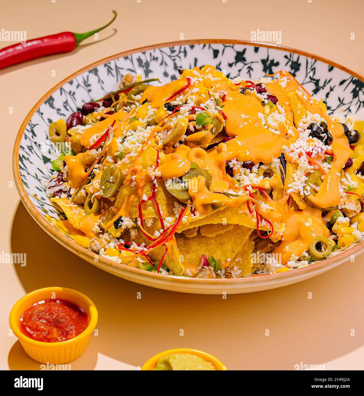 Mexican style nacho salad on top view Stock Photo - Alamy