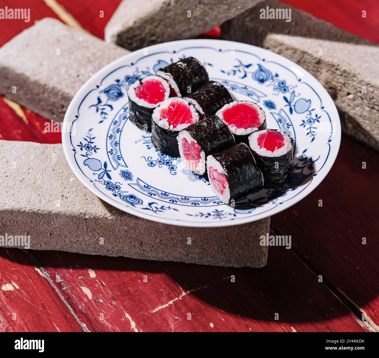 sushi maki rolls with tuna inside on stone brick Stock Photo - Alamy