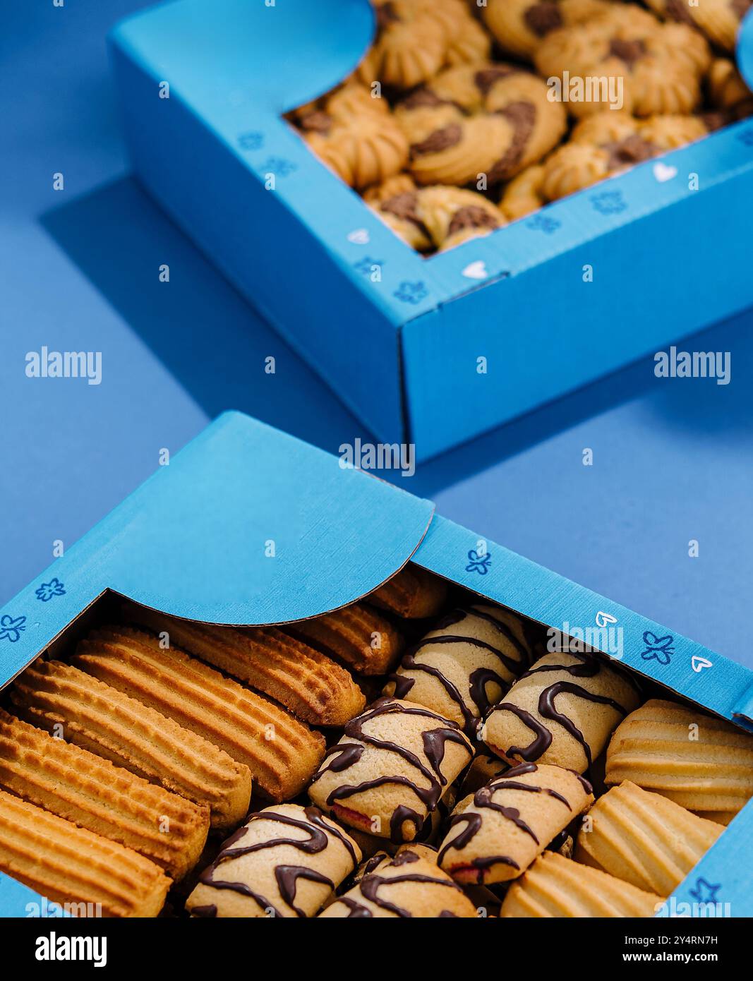 crumbly cookies in blue boxes Stock Photo - Alamy