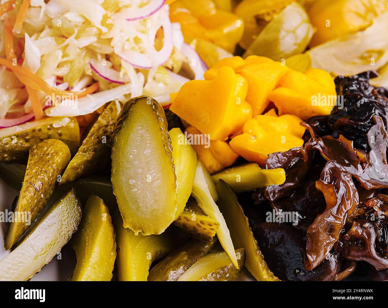 Marinated salty vegetables close up background Stock Photo - Alamy