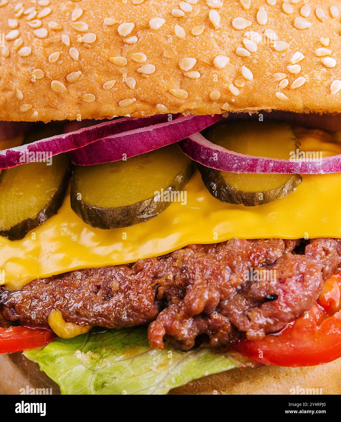 Fresh tasty burger close up background Stock Photo - Alamy