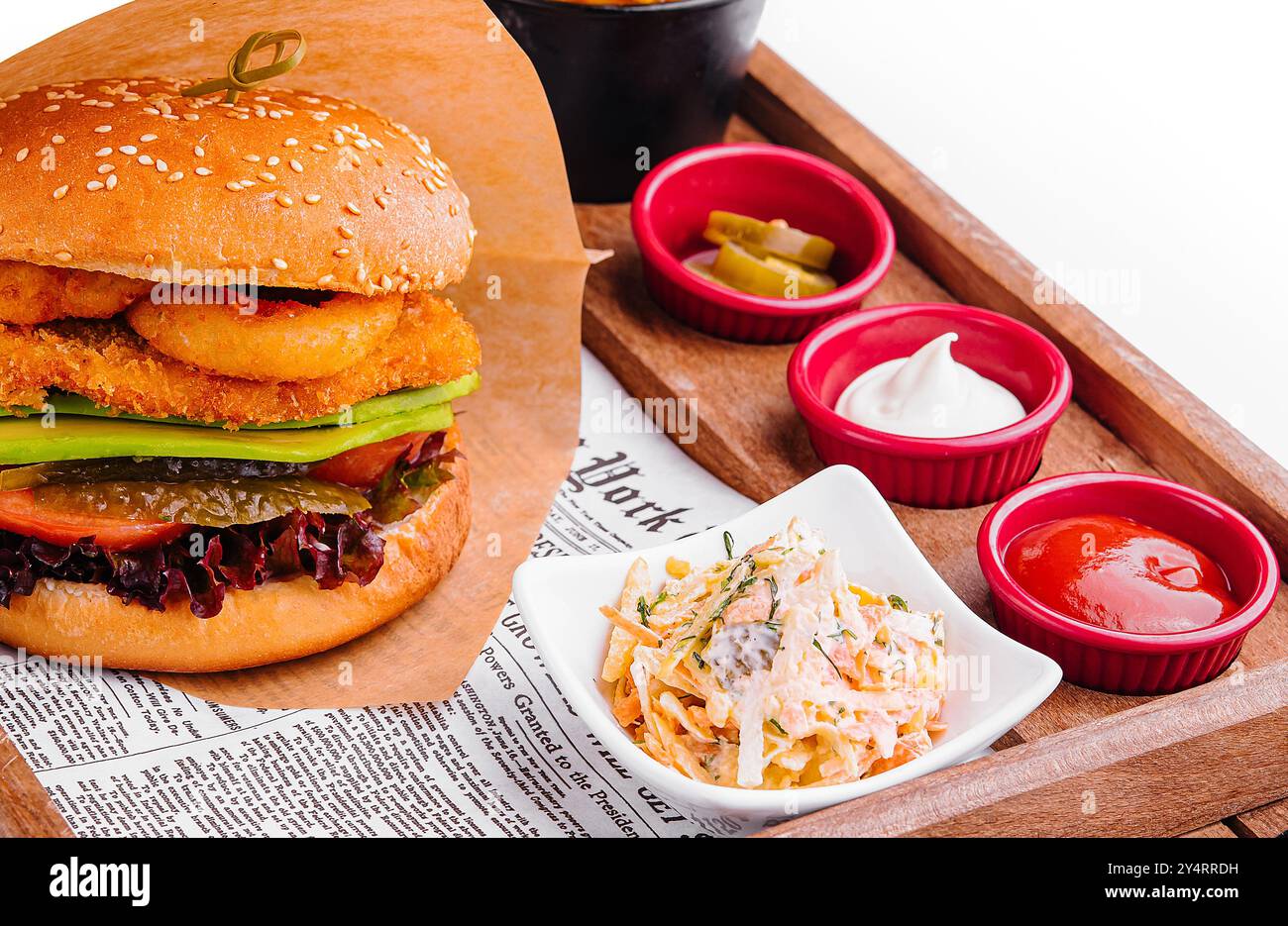 Gourmet seafood codfish burger with fish fillets dressed Stock Photo ...