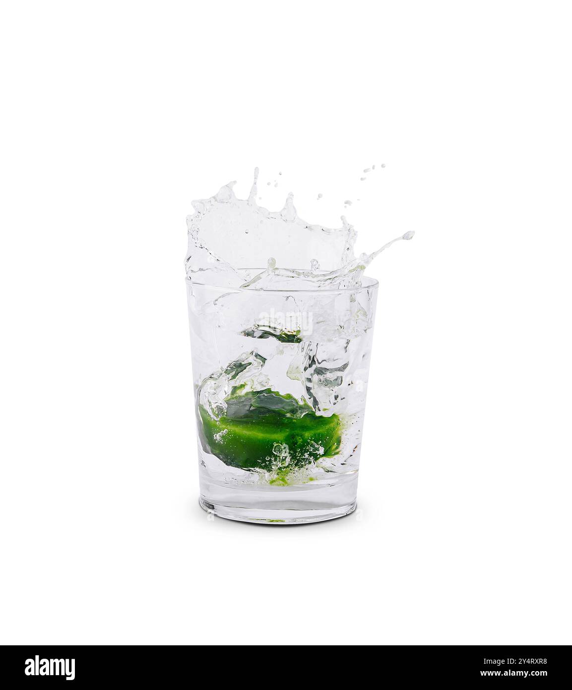 Lime slice dropping into a clear glass of water, creating a dynamic splash, isolated on a white ...