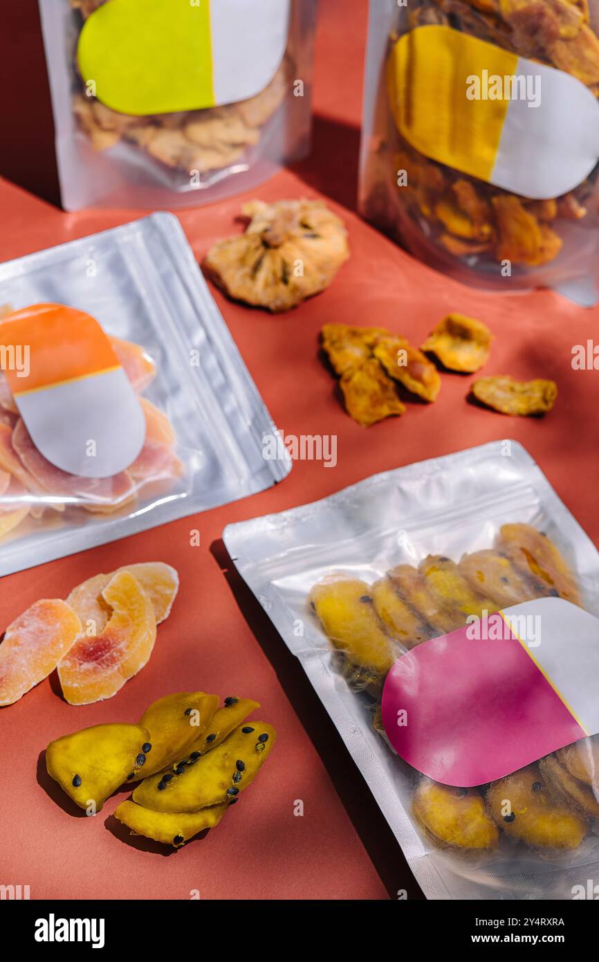 Colorful image featuring vacuum packaged dried fruits and meats on a ...