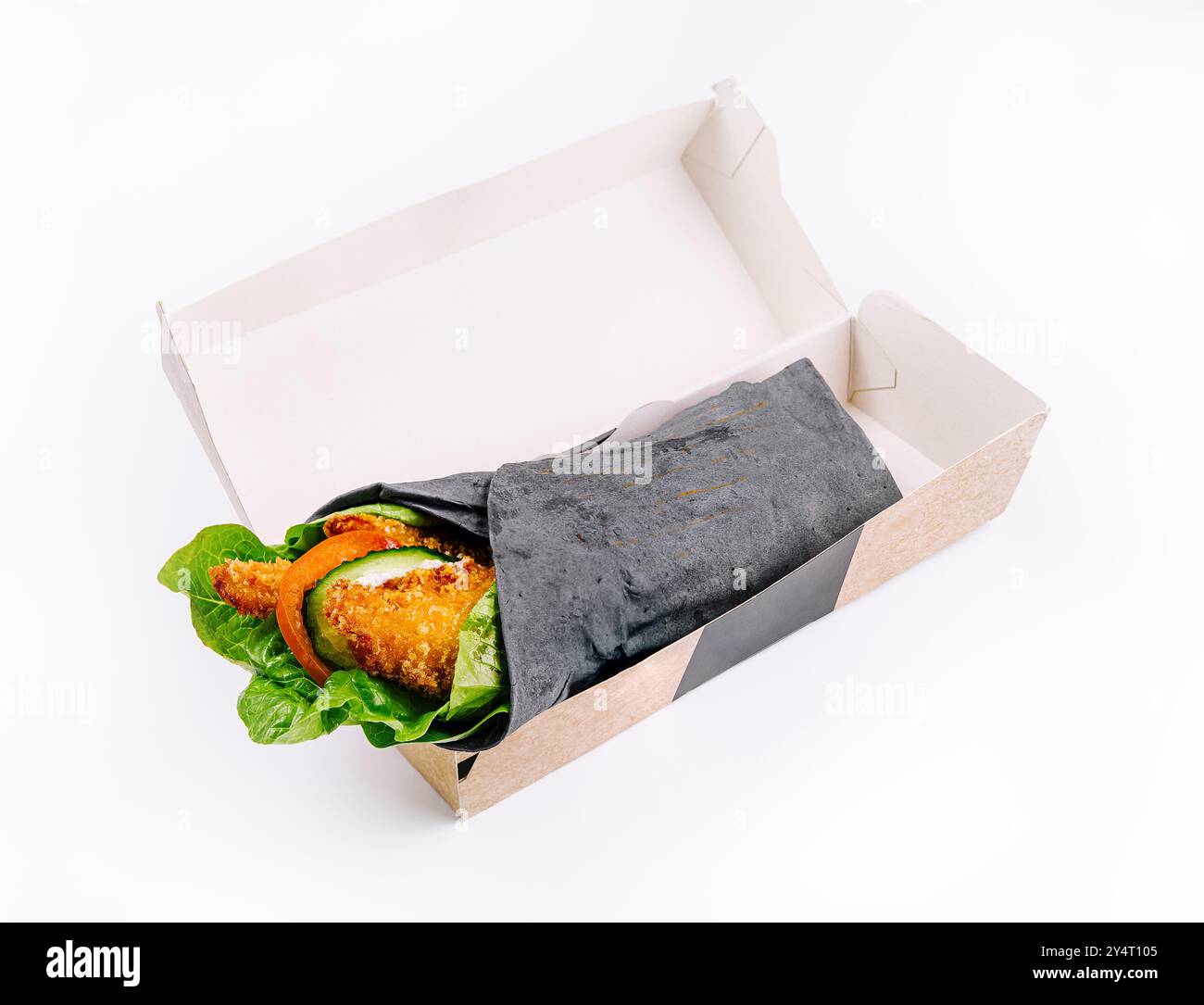 Healthy vegetable wrap in eco-friendly packaging, isolated on a white ...