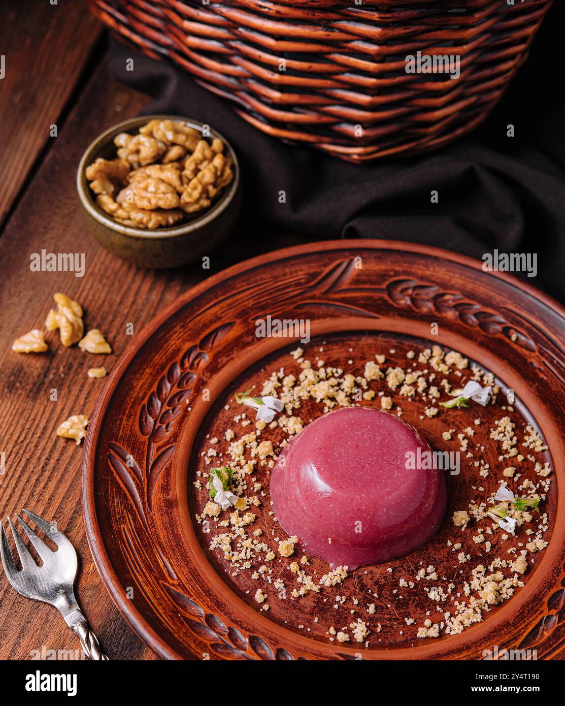 Aesthetic image of chocolate pudding topped with berry sorbet on a ...