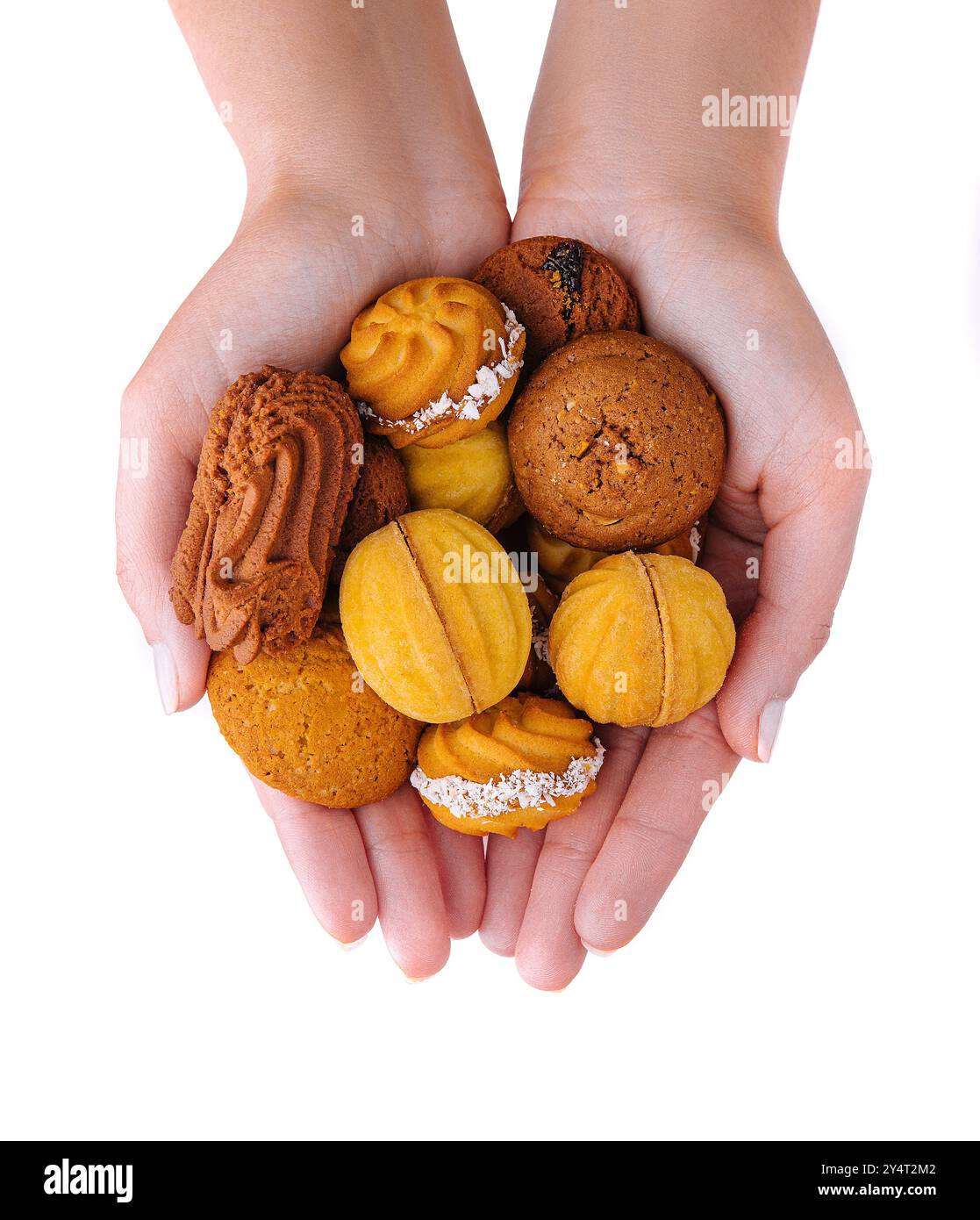Two hands holding a variety of cookies with a clean white background ...