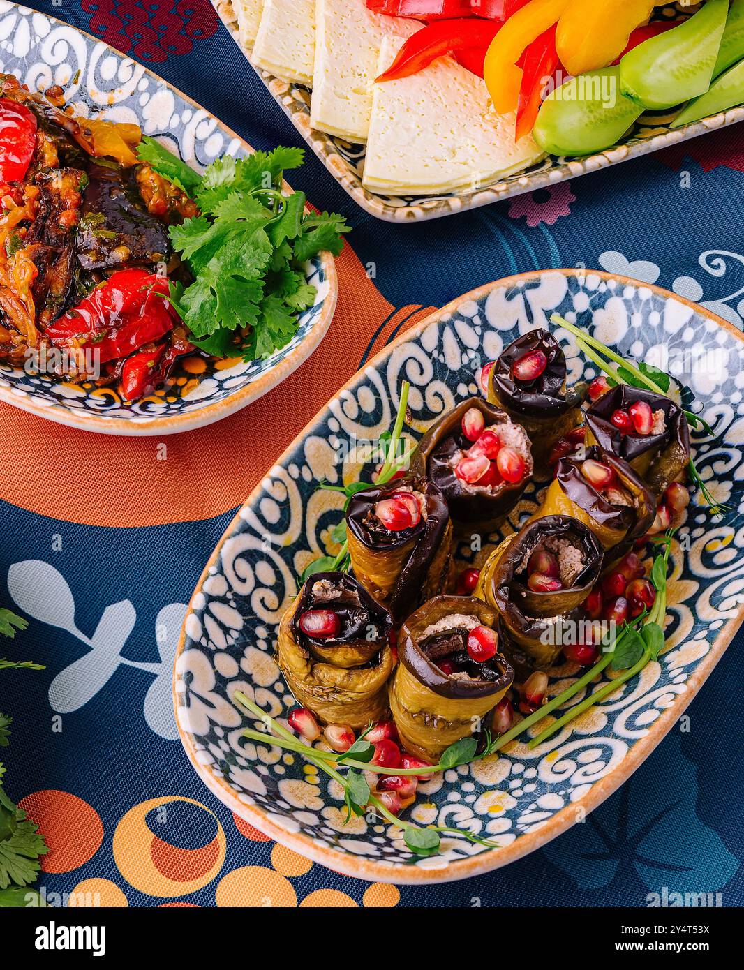 Vibrant dishes of a mediterranean meal laid out on a decorative ...