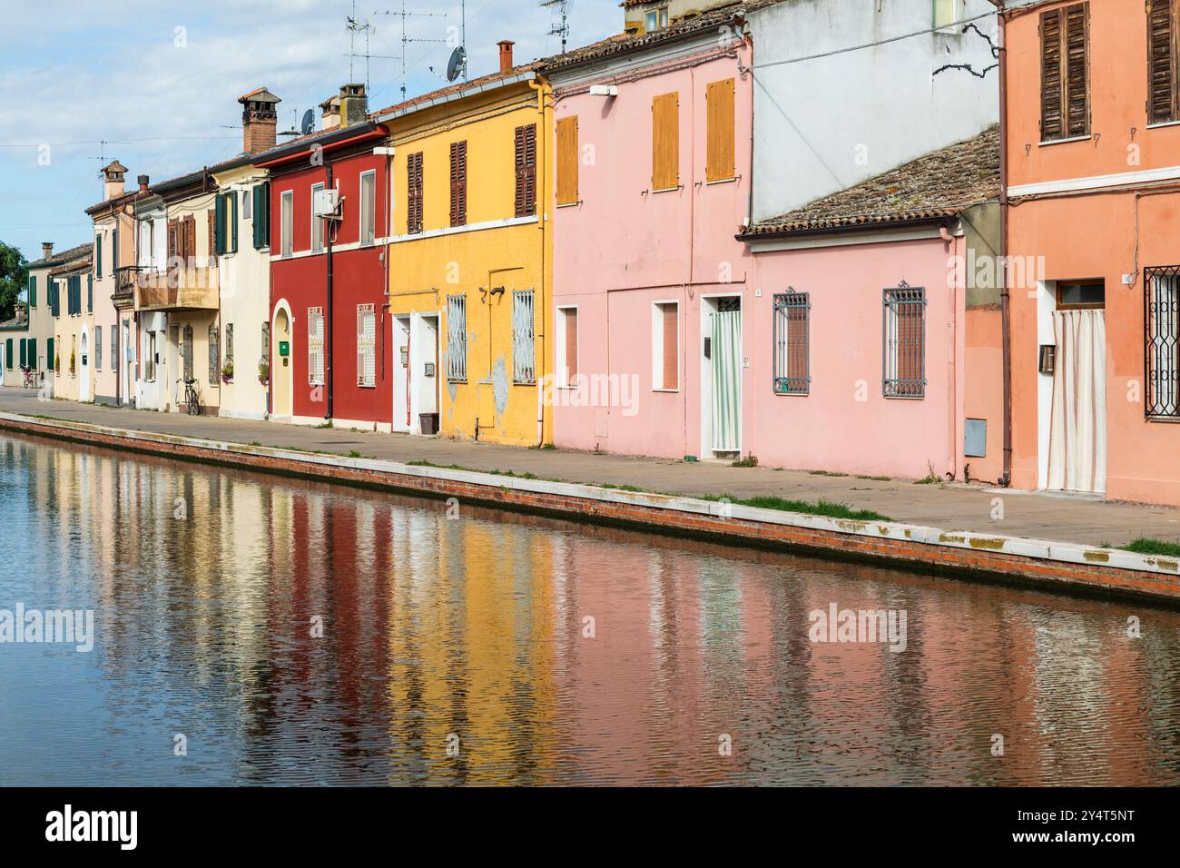 Comacchio, Italy - 11 July 2024: traditional colored buildings in ...