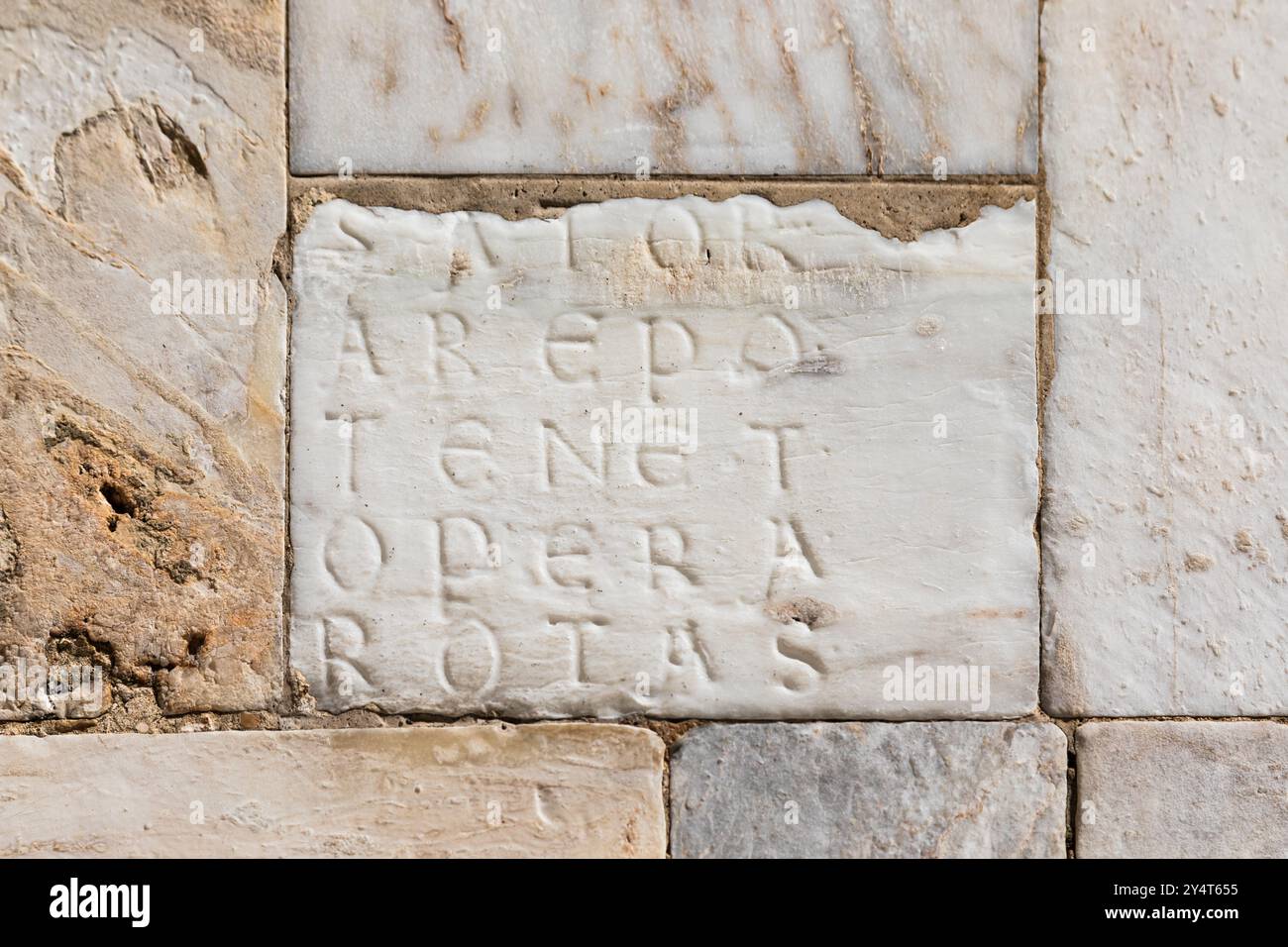 Facade of Siena Cathedral, Italy. The magic Sator square, esoteric word ...