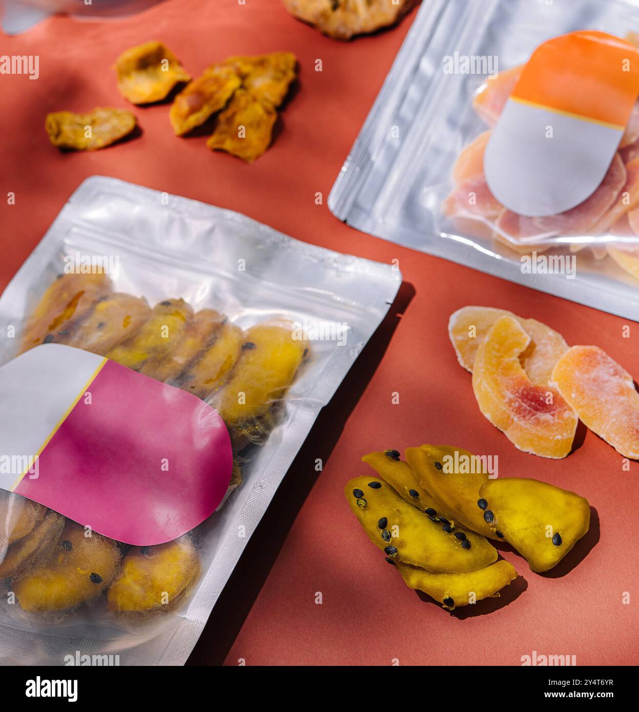 Colorful image featuring vacuum packaged dried fruits and meats on a ...