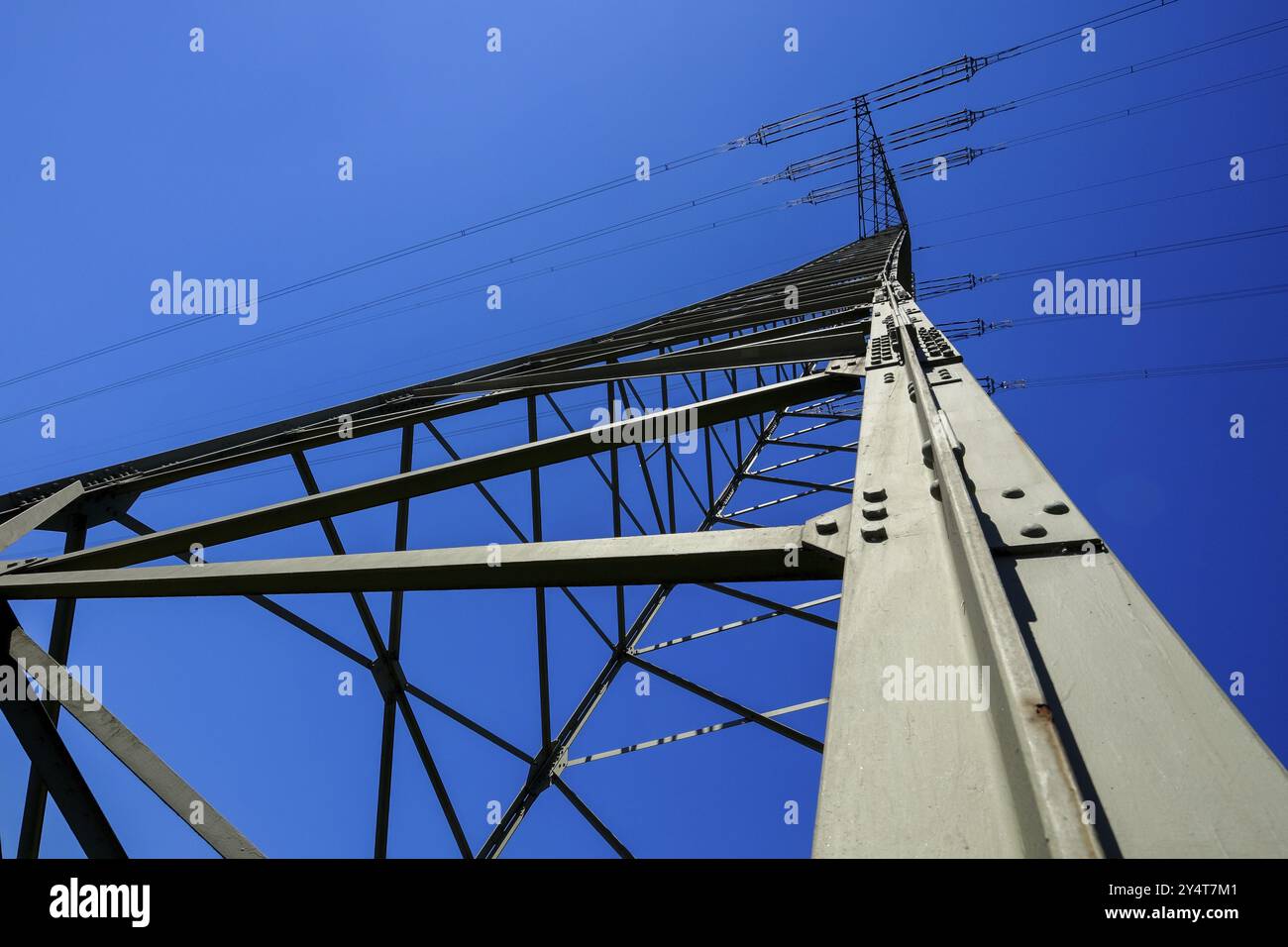 Electricity pylon with high-voltage lines Stock Photo - Alamy