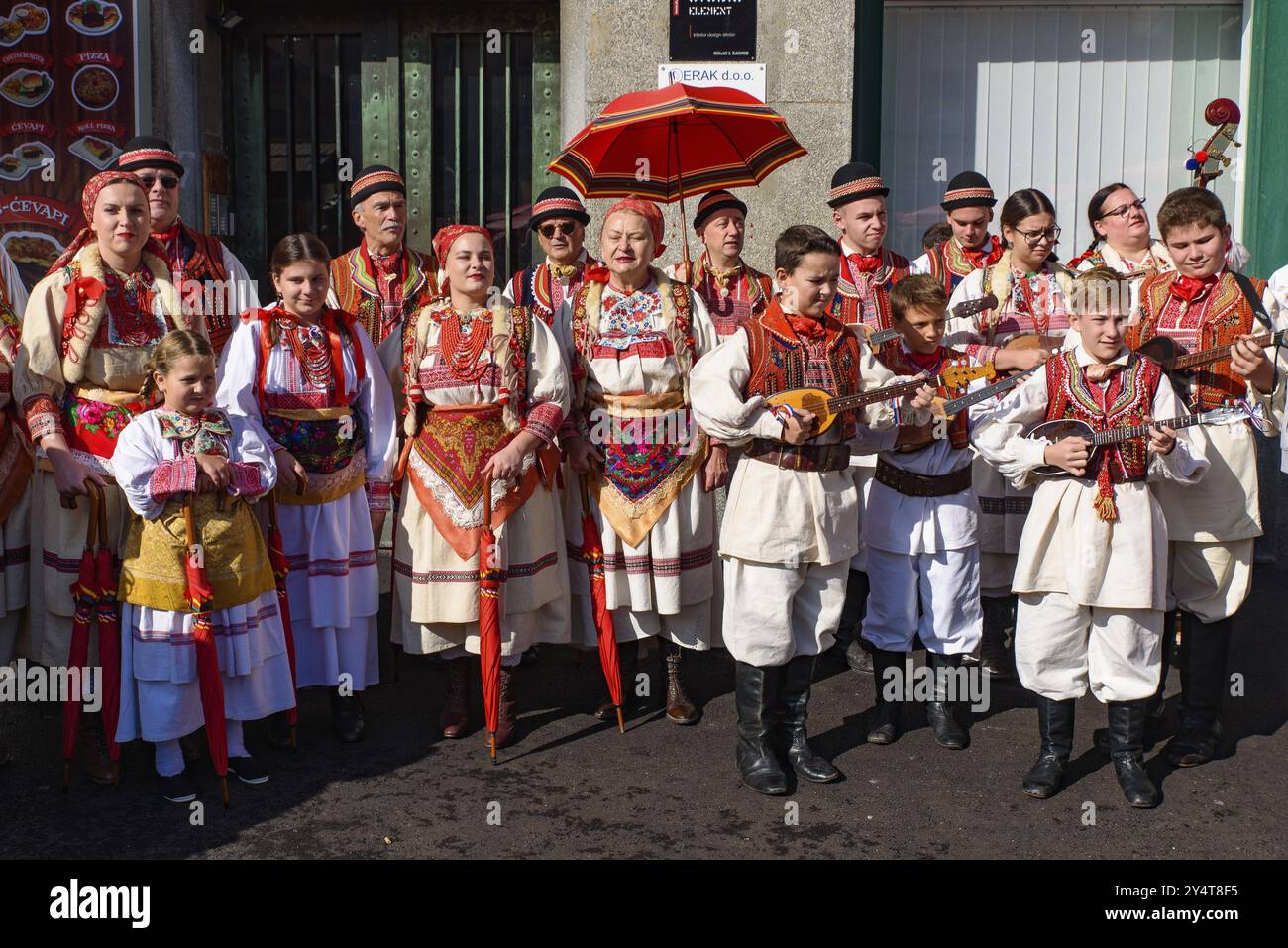 Local people with traditional clothes performing Croatian music and ...
