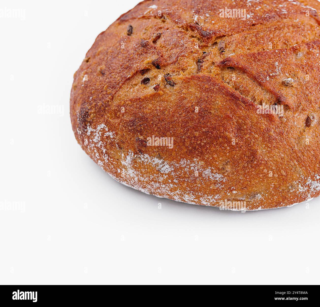 Artisan loaf of bread with a crusty exterior isolated on a white ...
