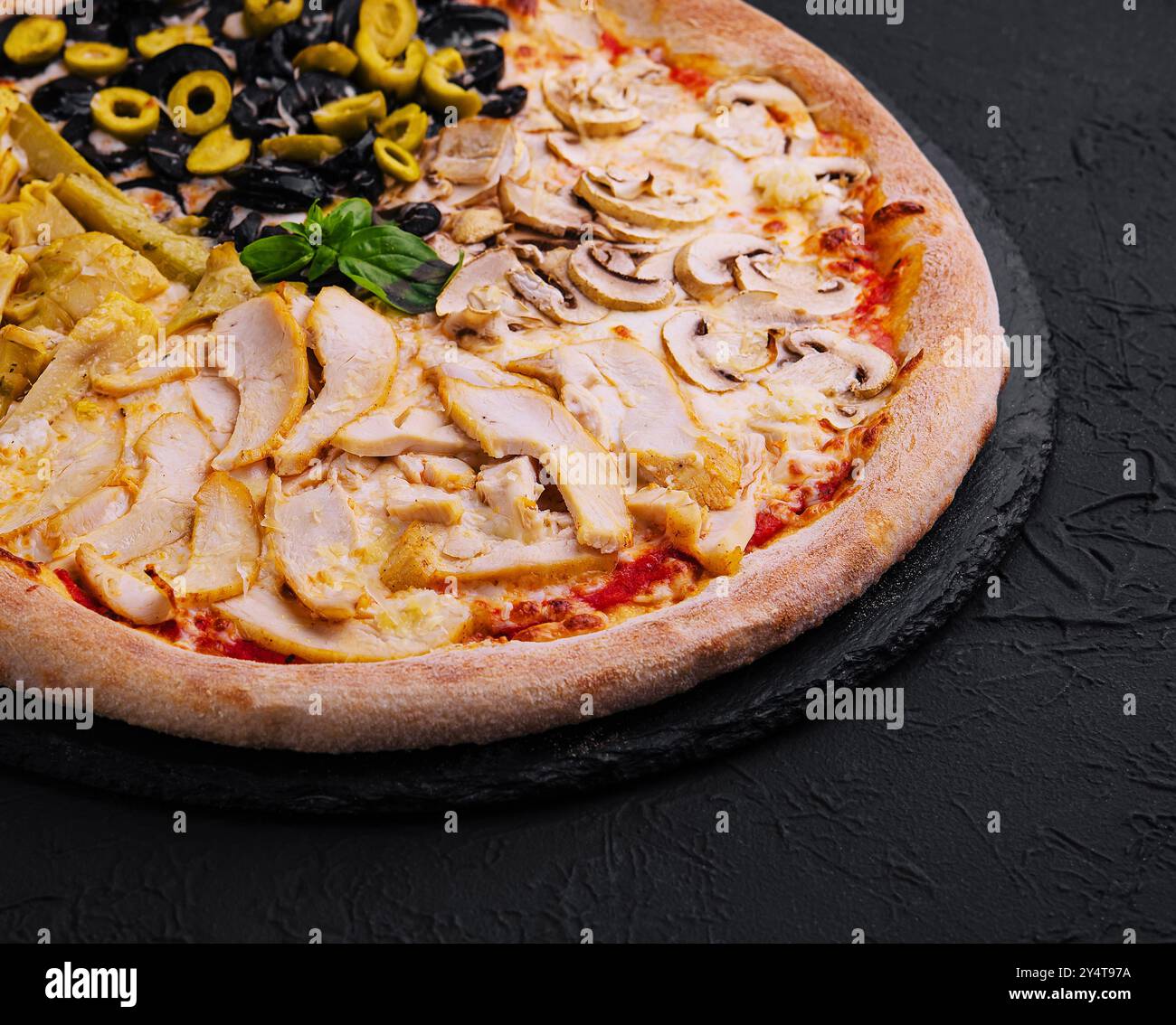 Delicious split-topping pizza with fresh ingredients, perfect for food ...