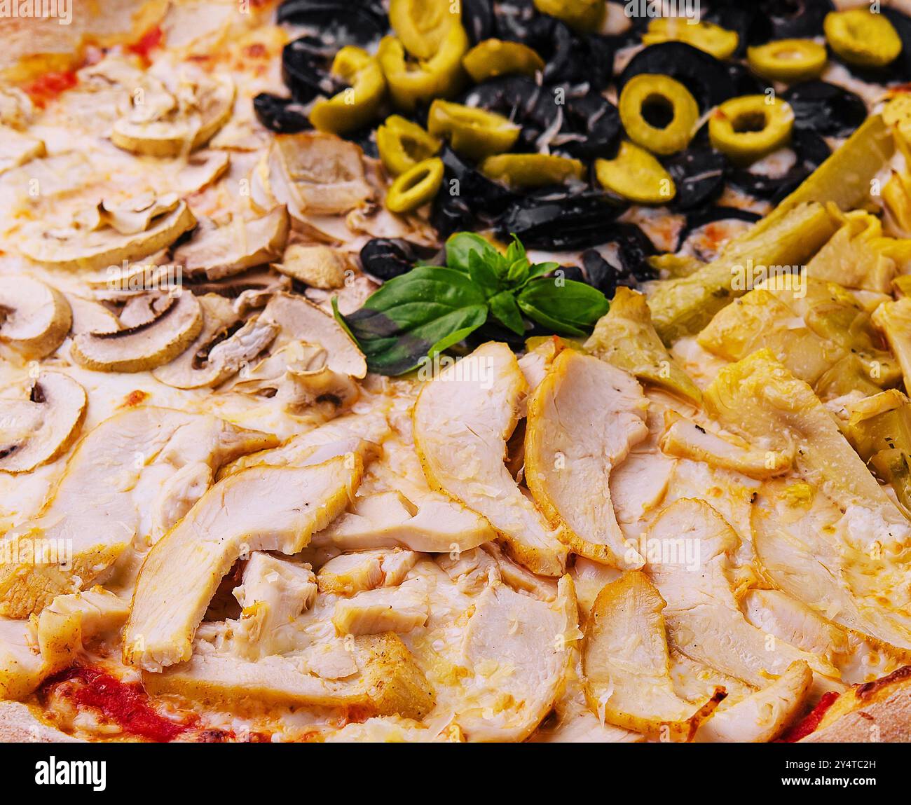 Delicious split-topping pizza with fresh ingredients, perfect for food ...