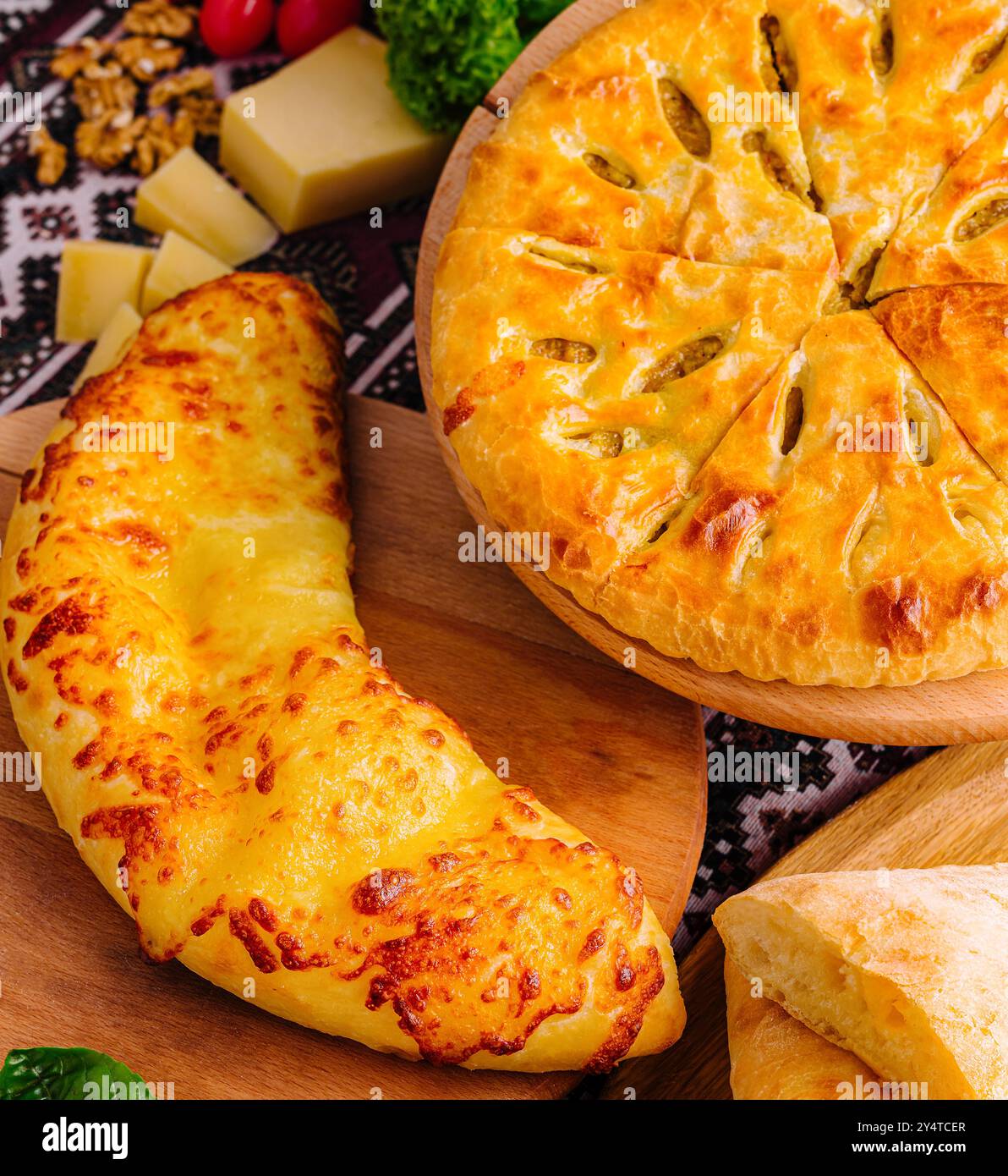 Delicious homemade cheese bread and pie, served with cheese cubes and ...