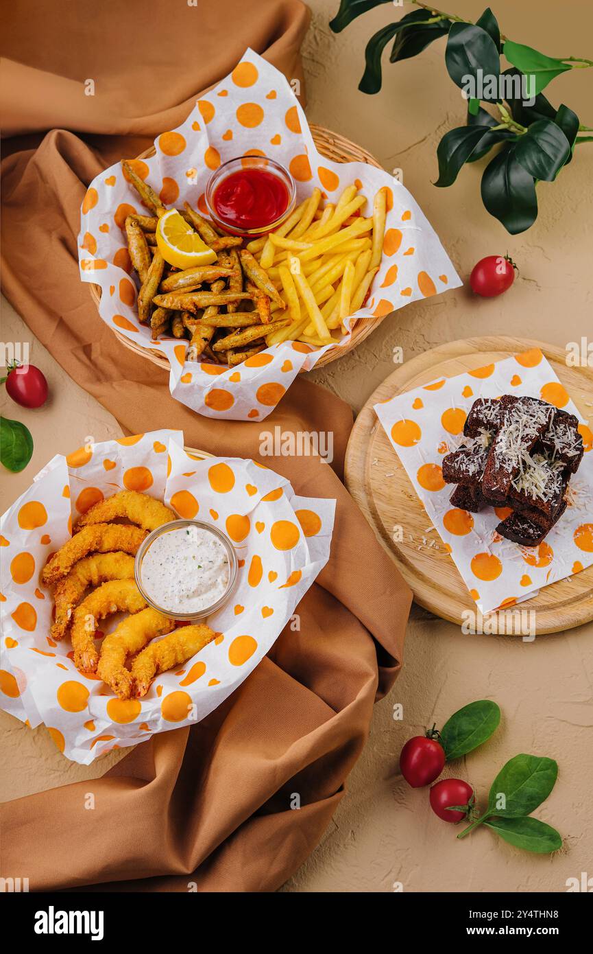 Tempting display of fast food featuring onion rings, fries, and a ...