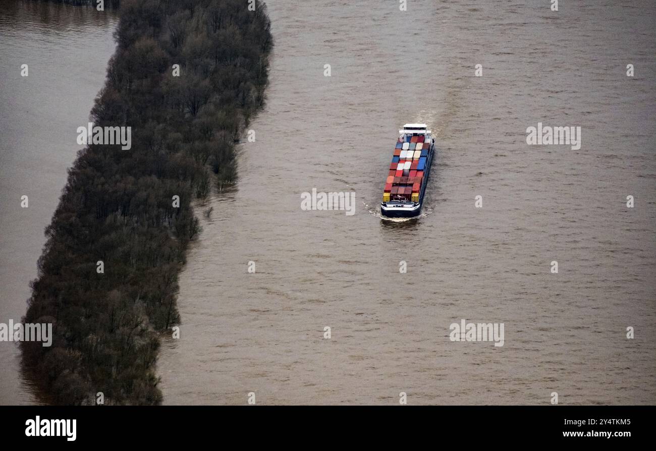 Container ship on the Rhine near Wesel at high tide Stock Photo - Alamy