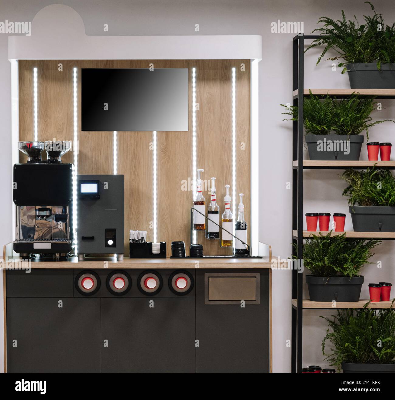 Stylish coffee area with machine and accessories in a contemporary ...