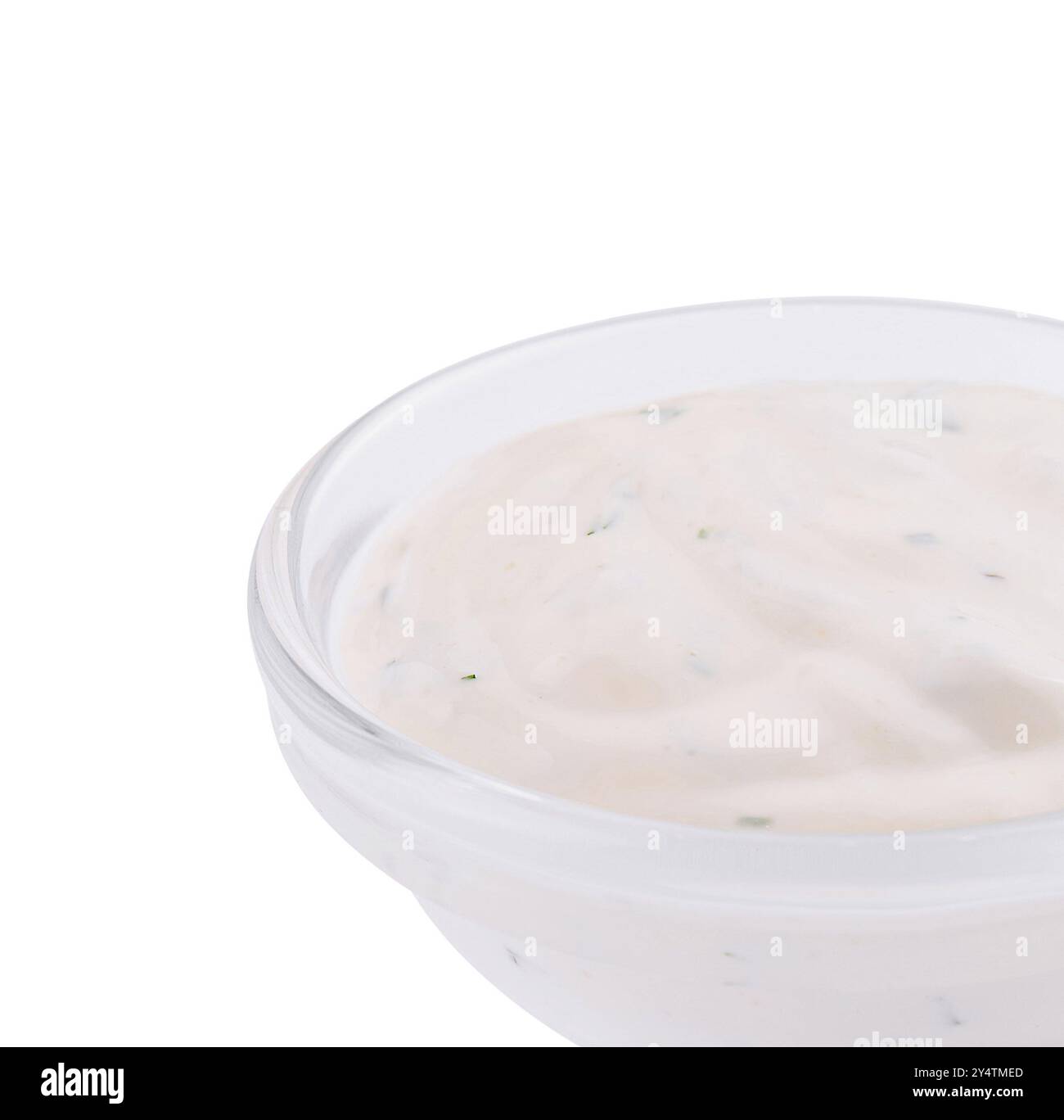 Fresh ranch sauce in a transparent bowl, isolated on a white background ...
