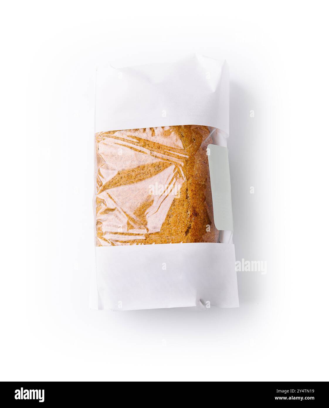 Delicious loaf of bread wrapped in plastic and paper packaging with ...