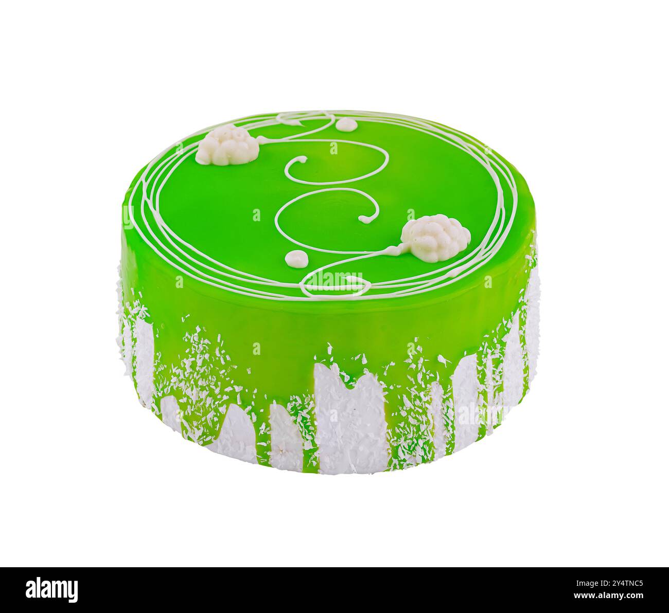 Round green cake with white chocolate swirls and coconut flakes ...