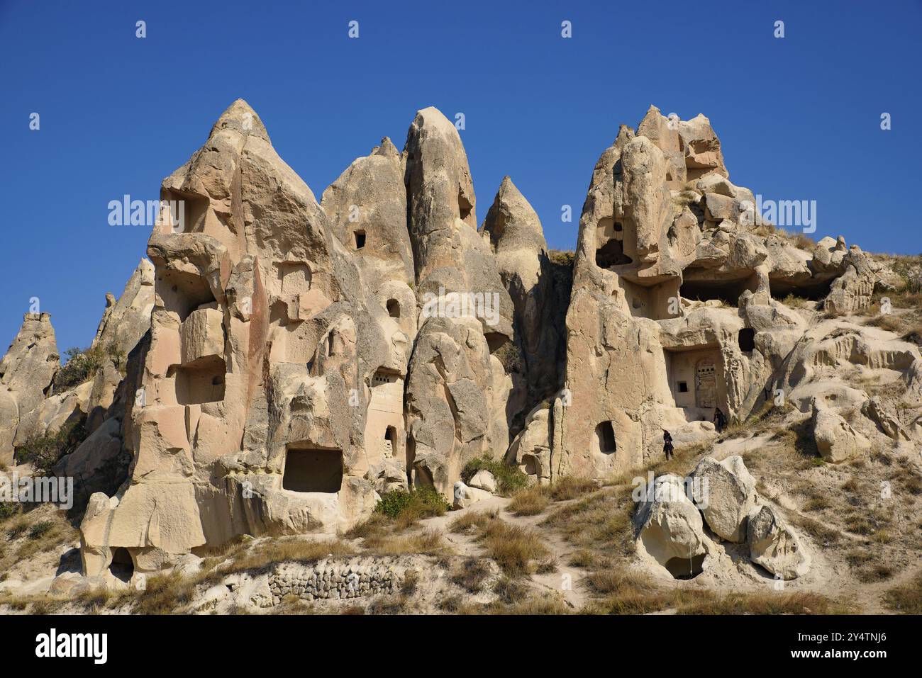 Cave houses carved in stone at Goereme, Cappadocia, Turkey, Asia Stock ...