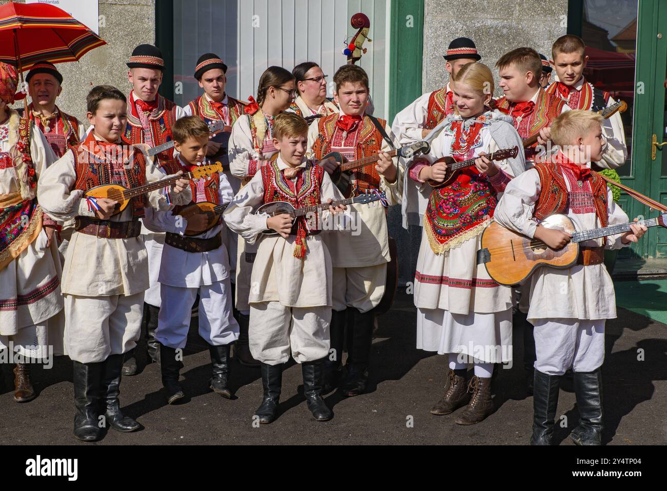 Local people with traditional clothes performing Croatian music and ...