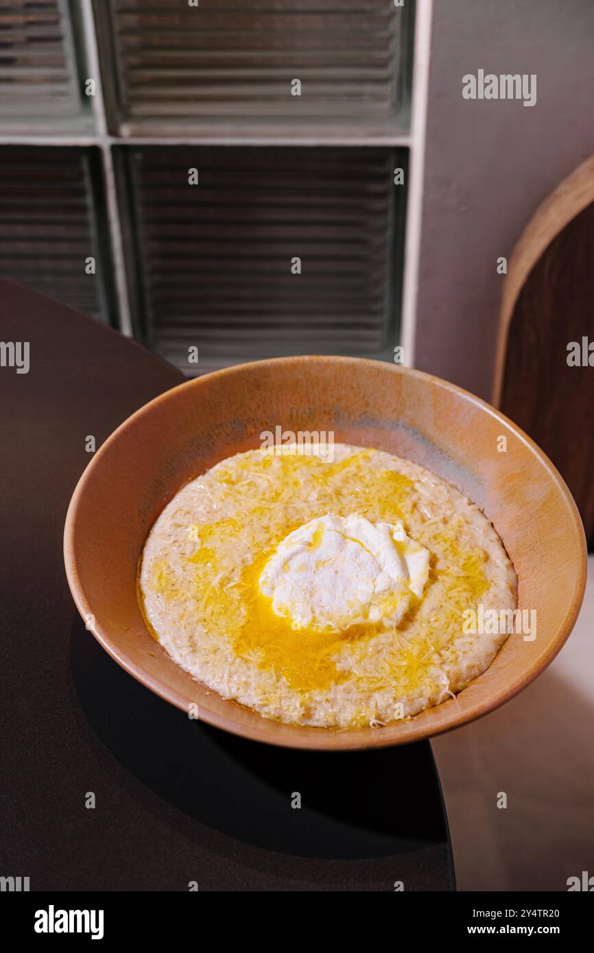 Modern restaurant is serving a classic italian comfort food, polenta ...