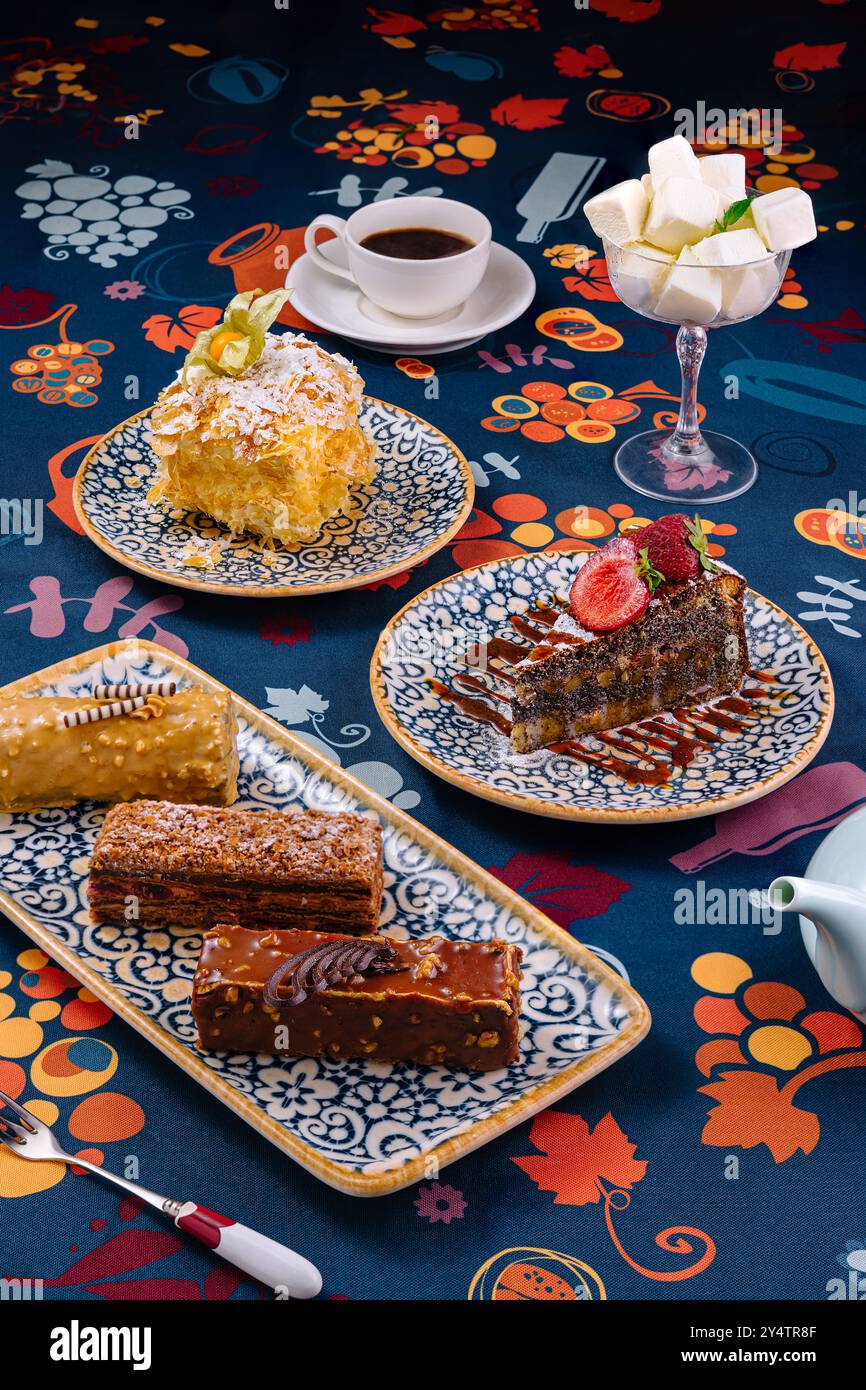 Tempting display of various cakes and pastries are beautifully arranged ...