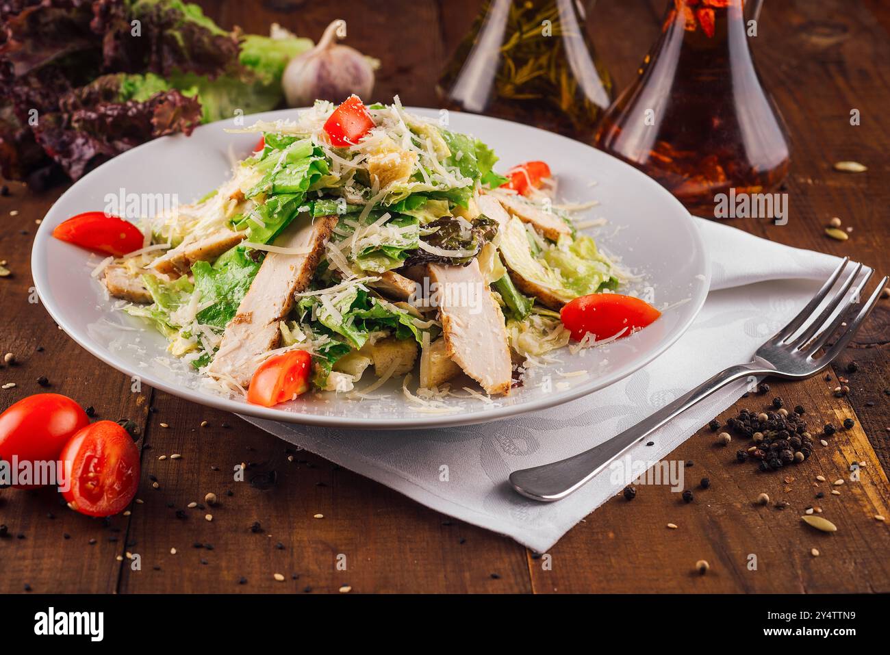 Traditional caesar salad with grilled chicken fillet, lettuce, parmesan ...