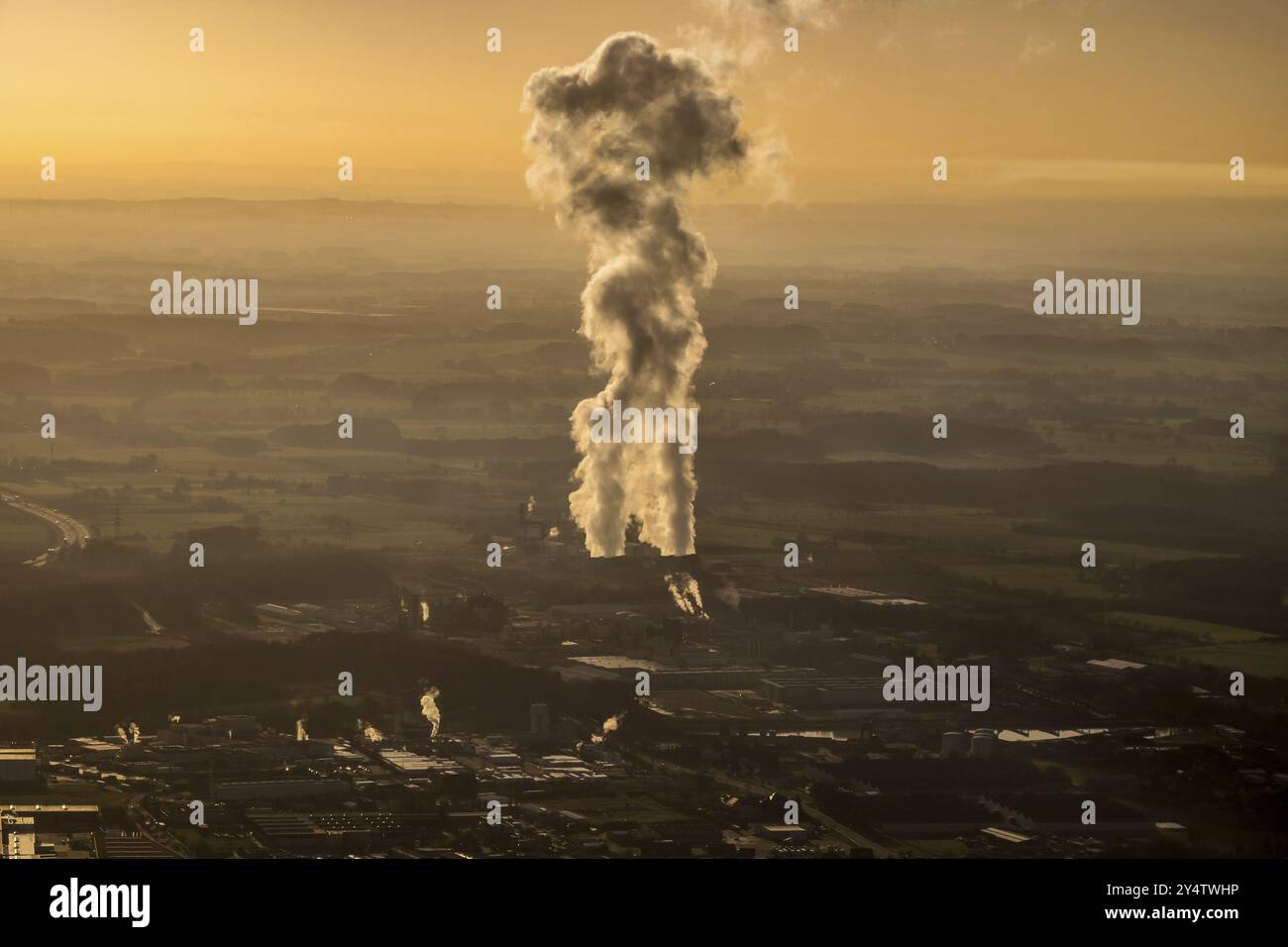Column of smoke rises from a power station Stock Photo - Alamy