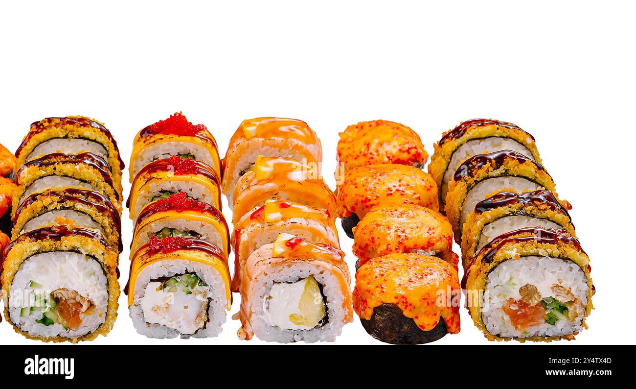 Different sushi rolls covered with sesame seeds and spicy sauce ...
