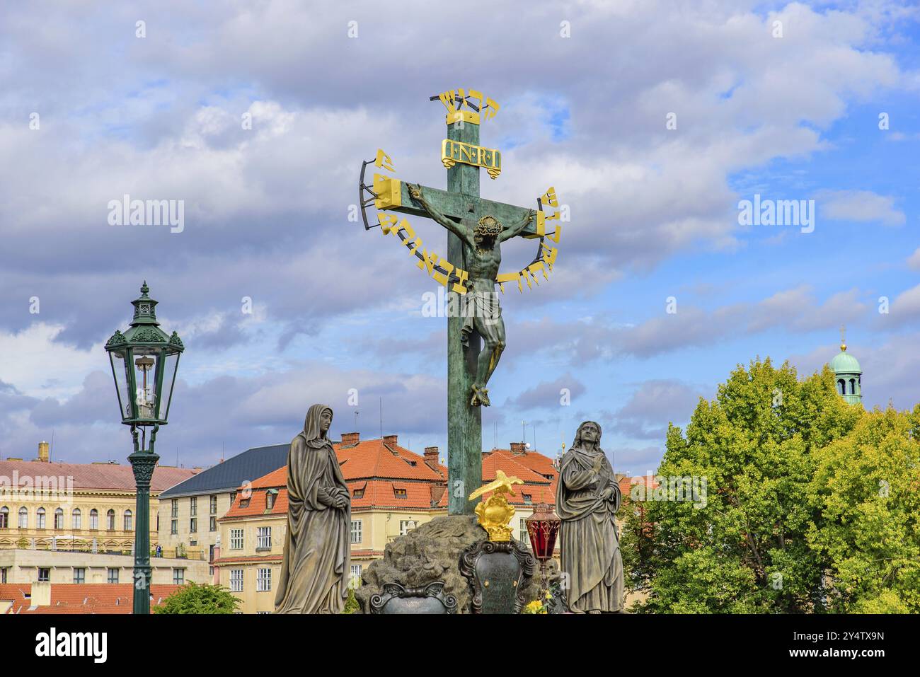 The statue Crucifix and Calvary on Charles Bridge in Prague, Czech ...