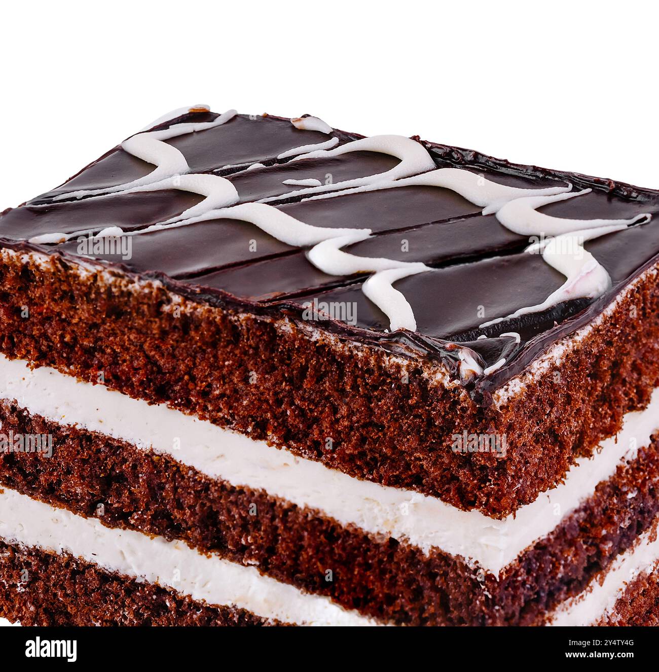 Delicious chocolate cake slice with layers of white cream isolated on ...