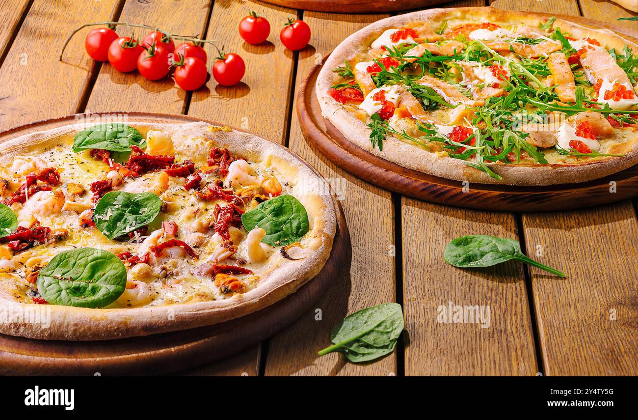 Artisanal pizzas with fresh toppings top view, rustic setting Stock ...