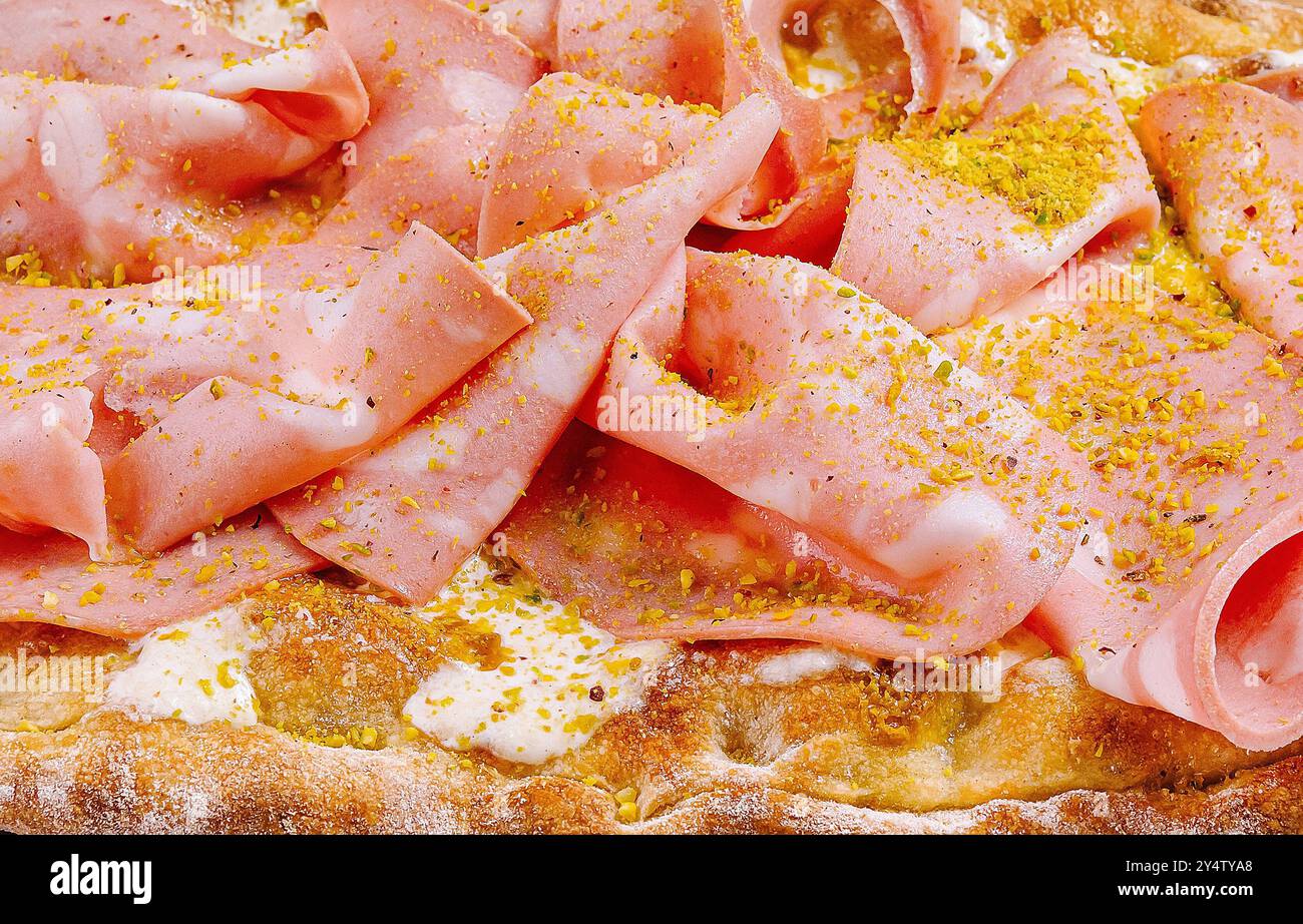 Delicious mortadella-topped flatbread seasoned with spices close up ...
