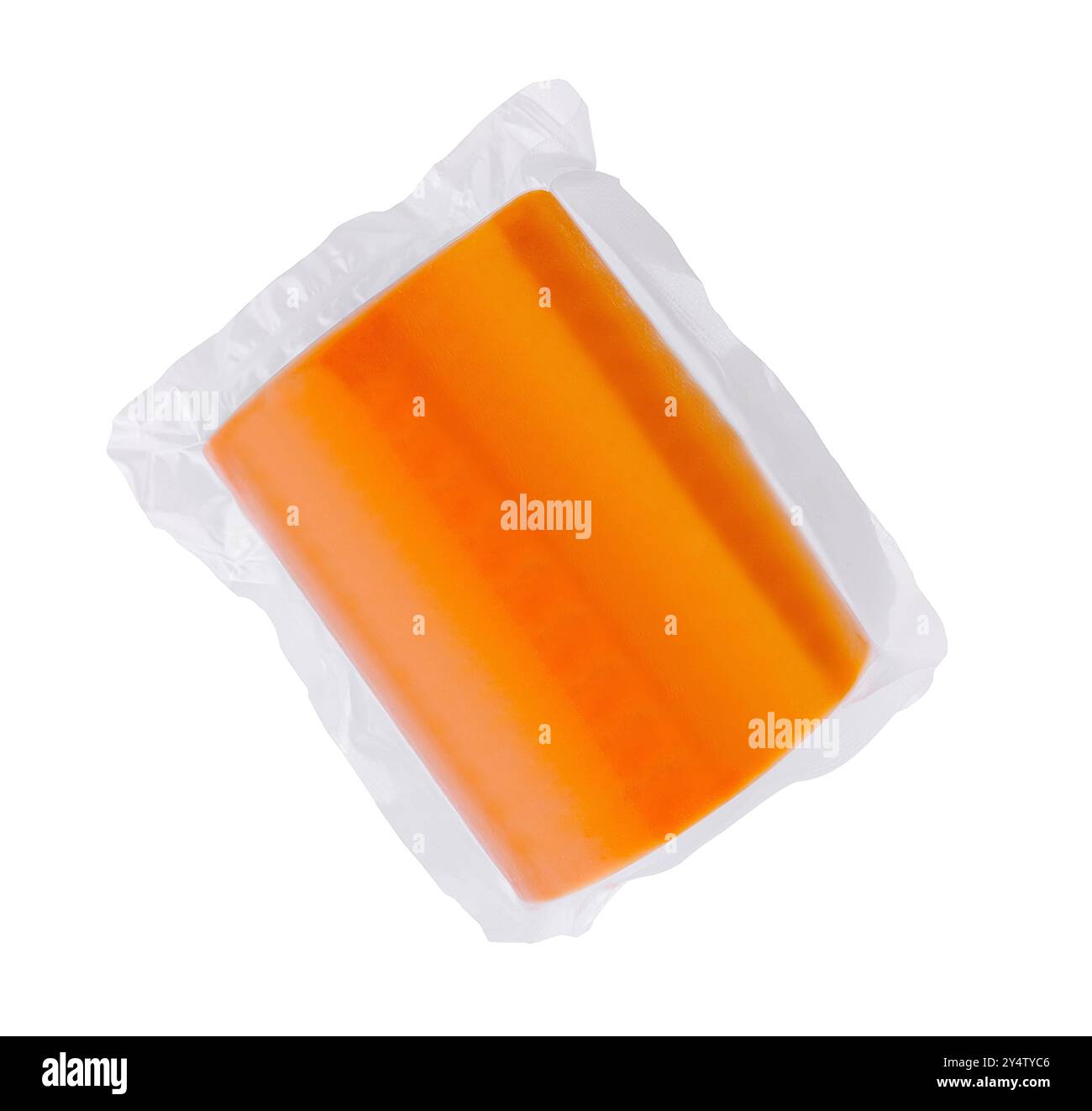 Block of cheddar cheese wrapped in plastic staying fresh and ready to ...