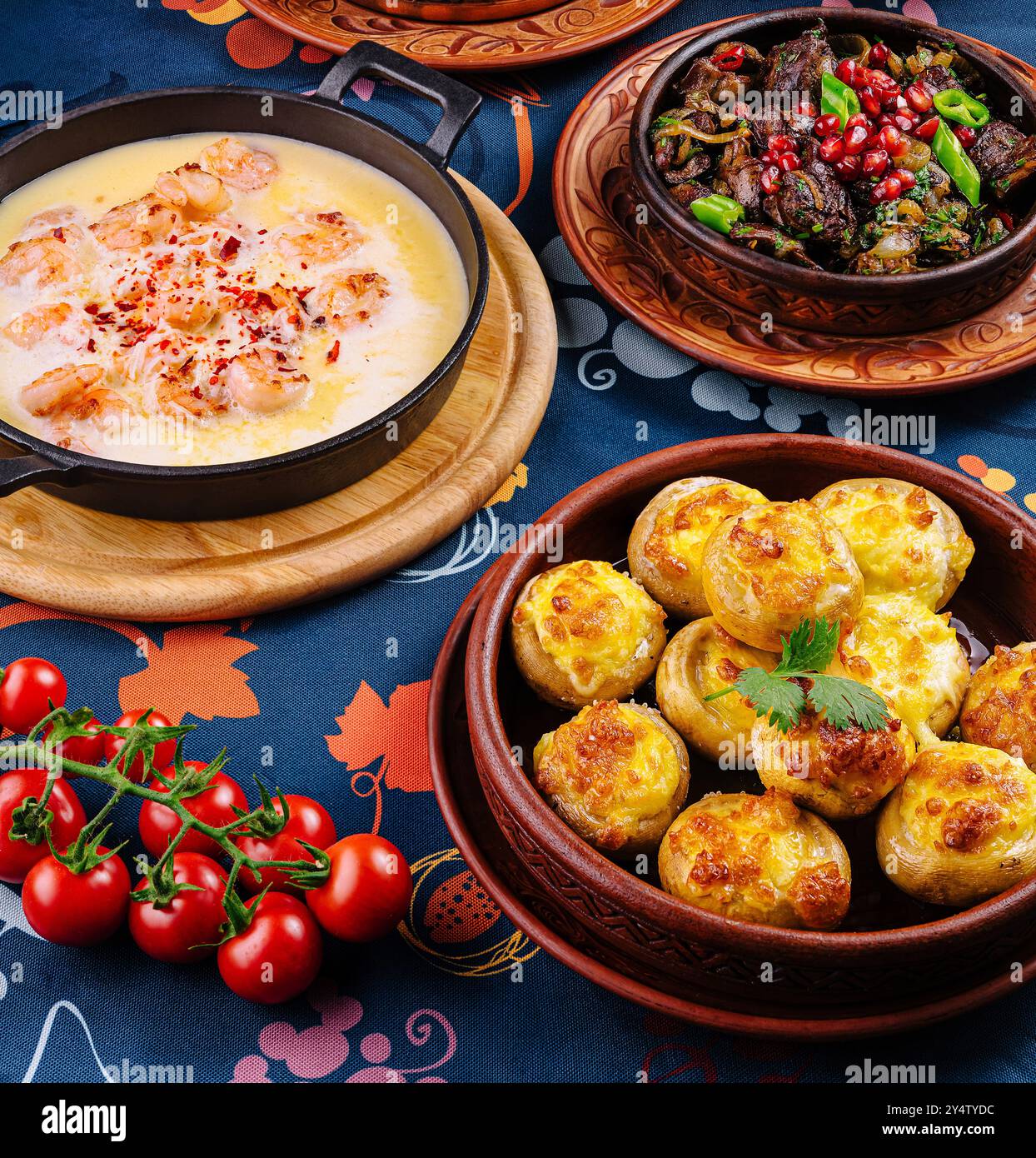 Variety of georgian dishes in traditional clay pots on a table with a ...