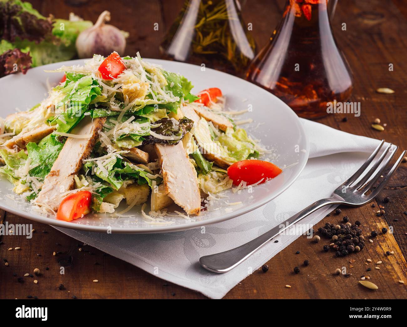 Traditional caesar salad with grilled chicken fillet, lettuce, parmesan ...