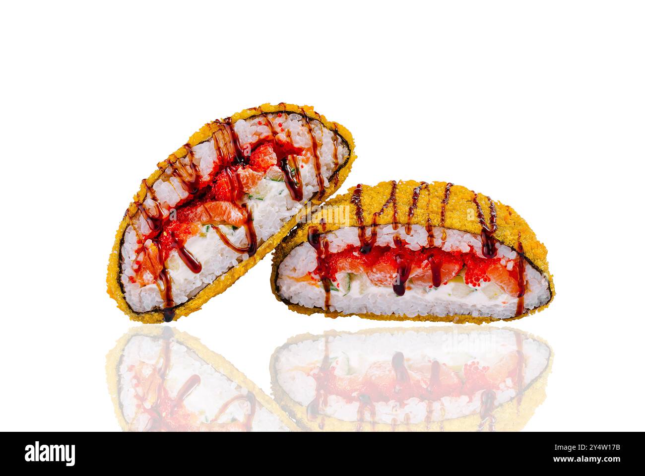 Two sushi rolls cut in half lying on a white background, showing the ...