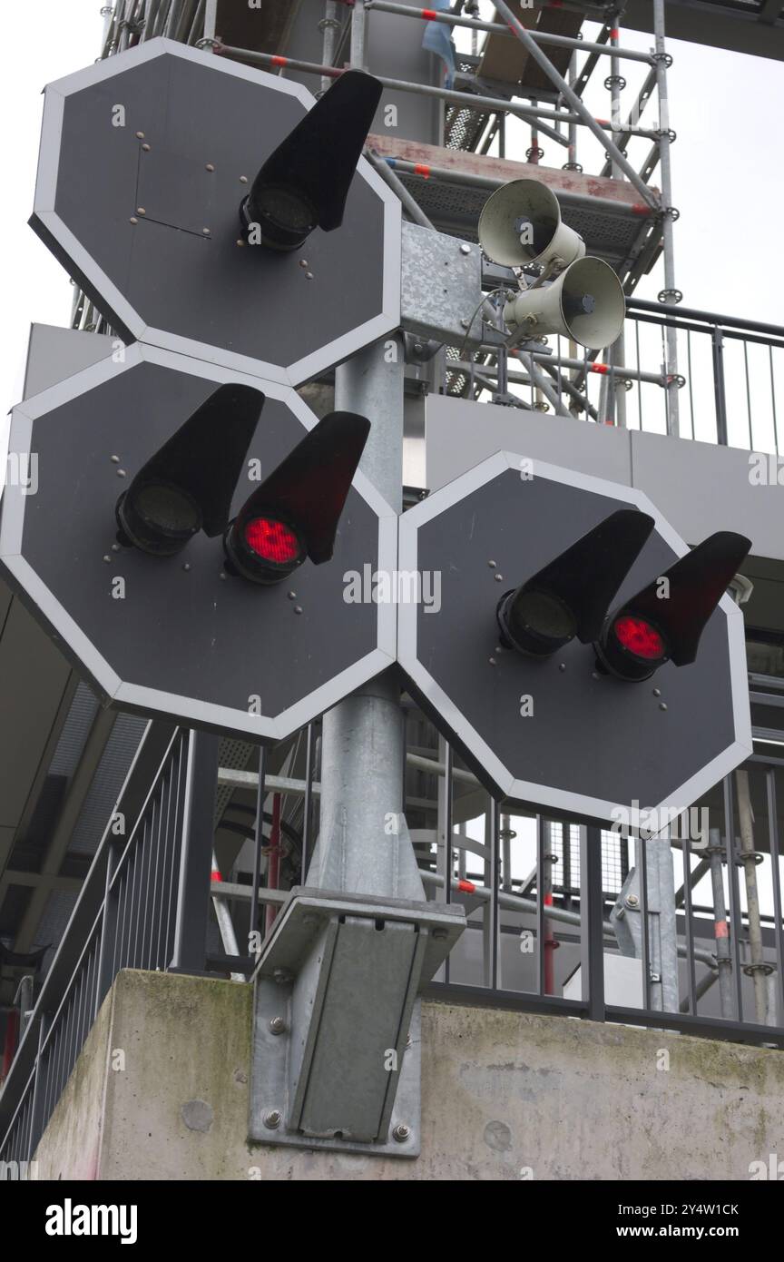 A boat lock traffic light at the canals of Hamburg harbor controls what ...