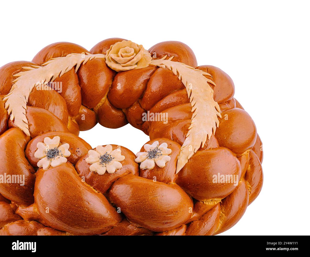 Delicious round loaf of bread decorated with flowers and wheat, baked ...