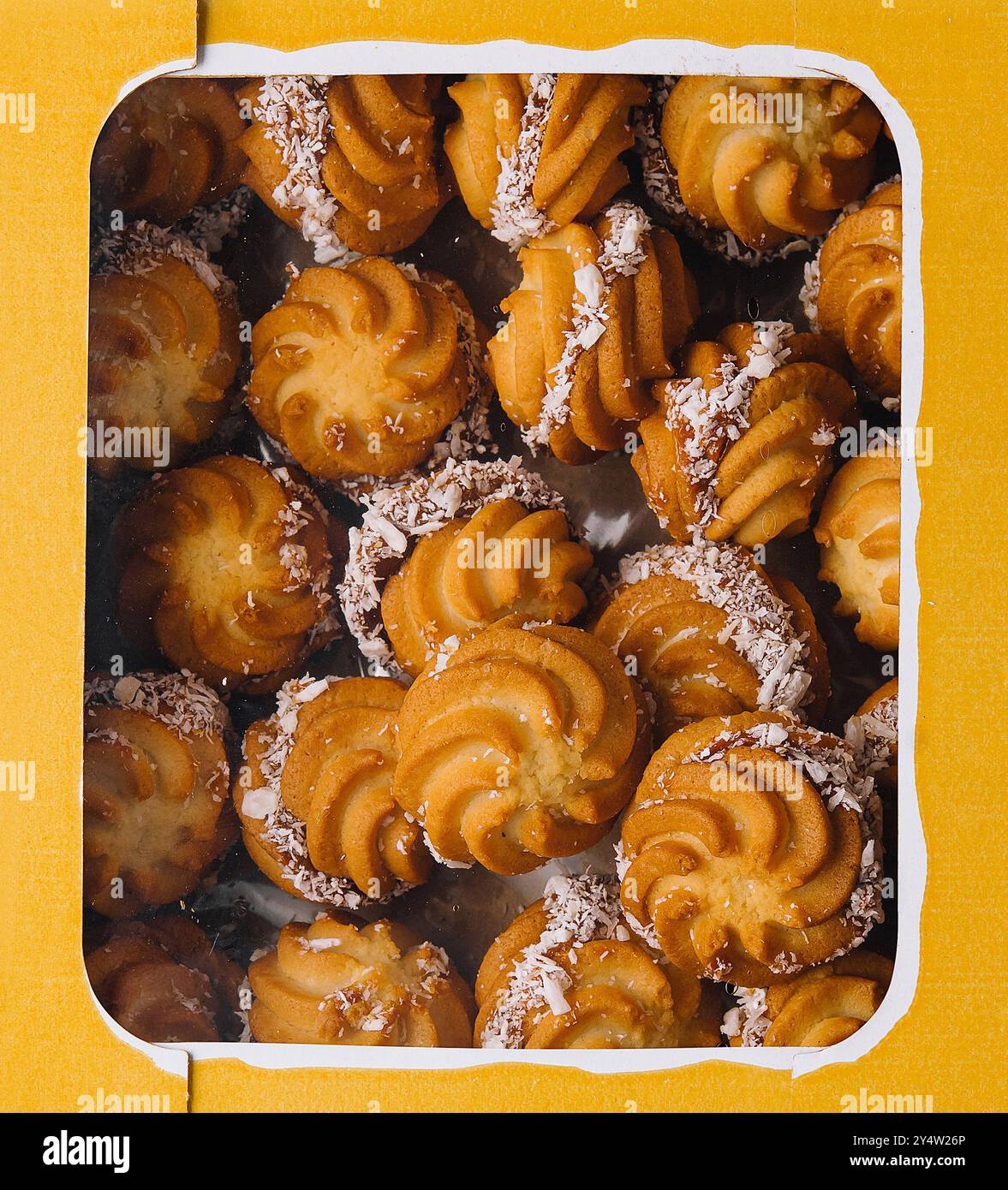 Top view of a box of delicious shortbread cookies with coconut ...